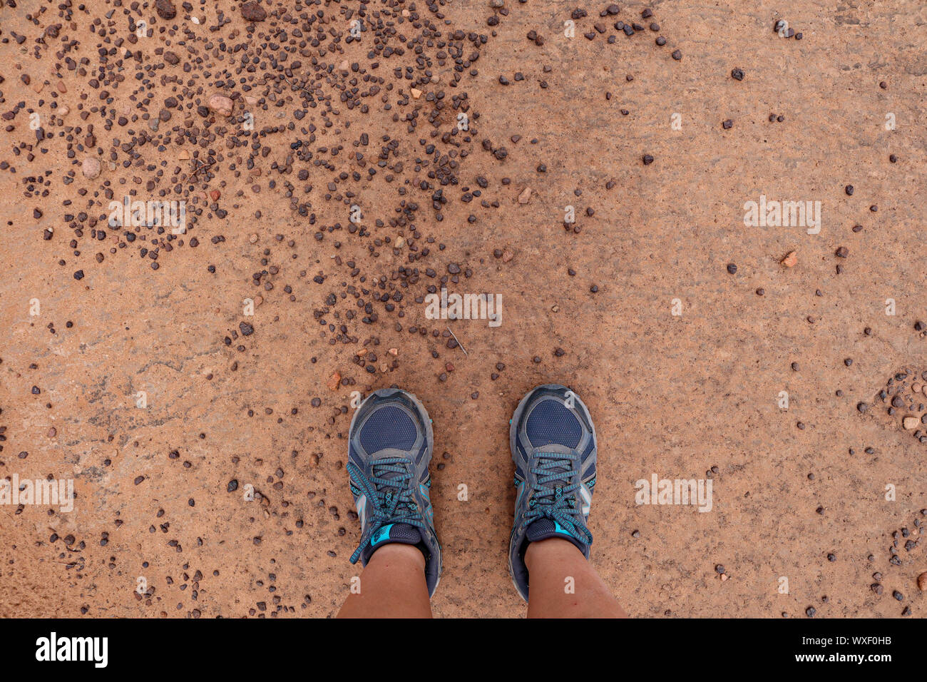 Travel feet on Arizona red dirt Stock Photo - Alamy