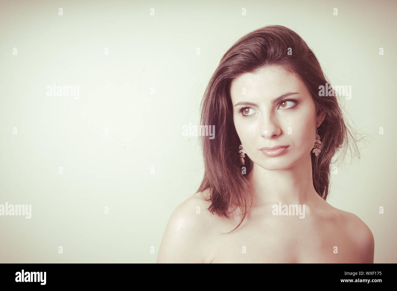vintage portrait of young woman on vignetting background Stock Photo ...