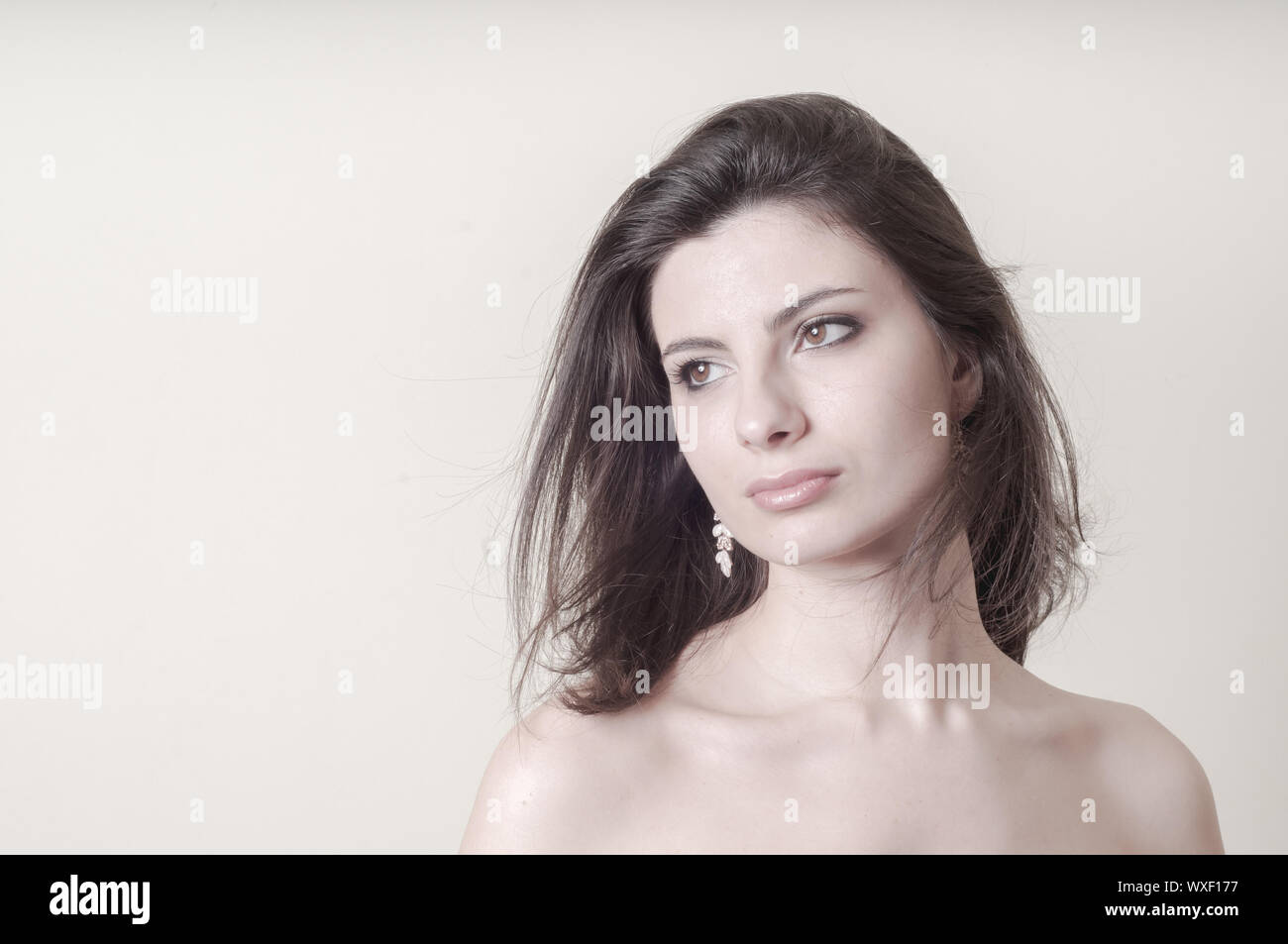 vintage portrait of young woman on vignetting background Stock Photo ...