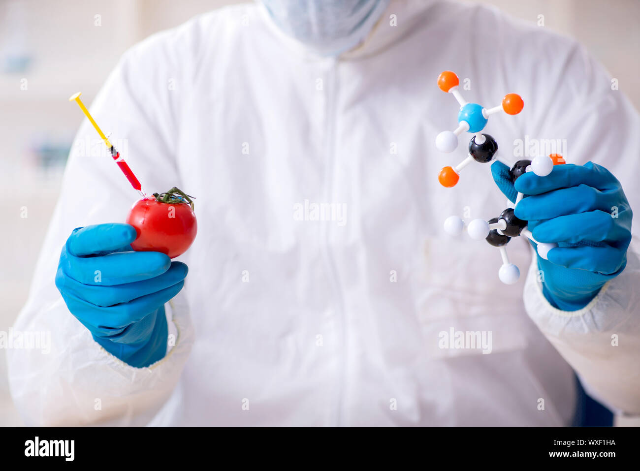 Male nutrition expert testing food products in lab Stock Photo - Alamy