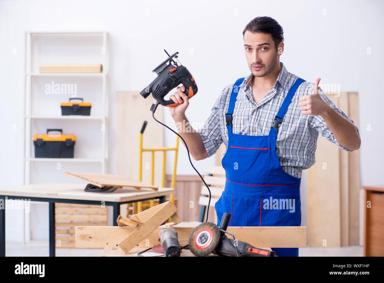 Happy carpenter thumbs up working hi-res stock photography and images ...