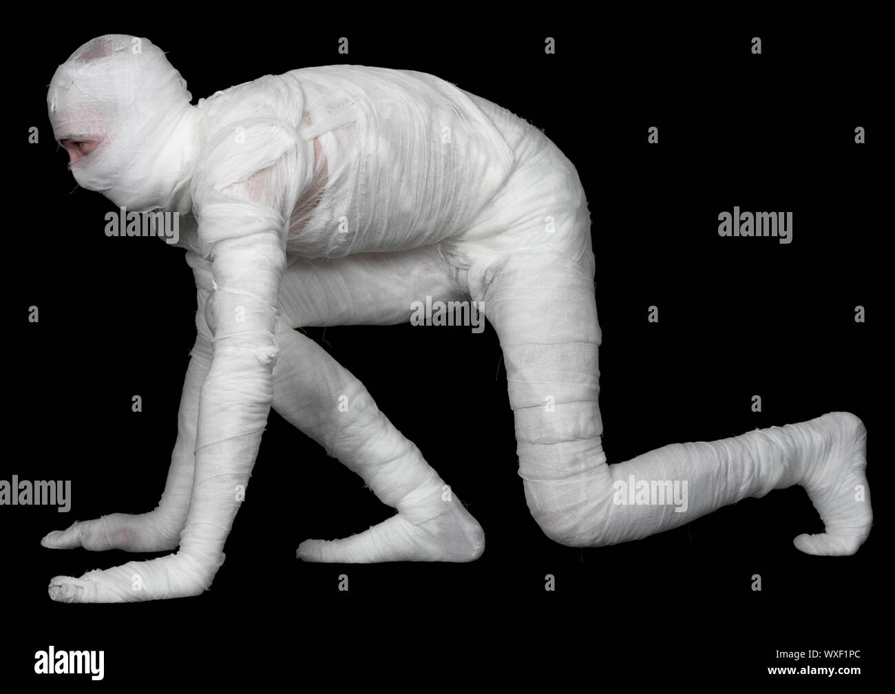 Man in clothes monster ready to start on the black background Stock ...