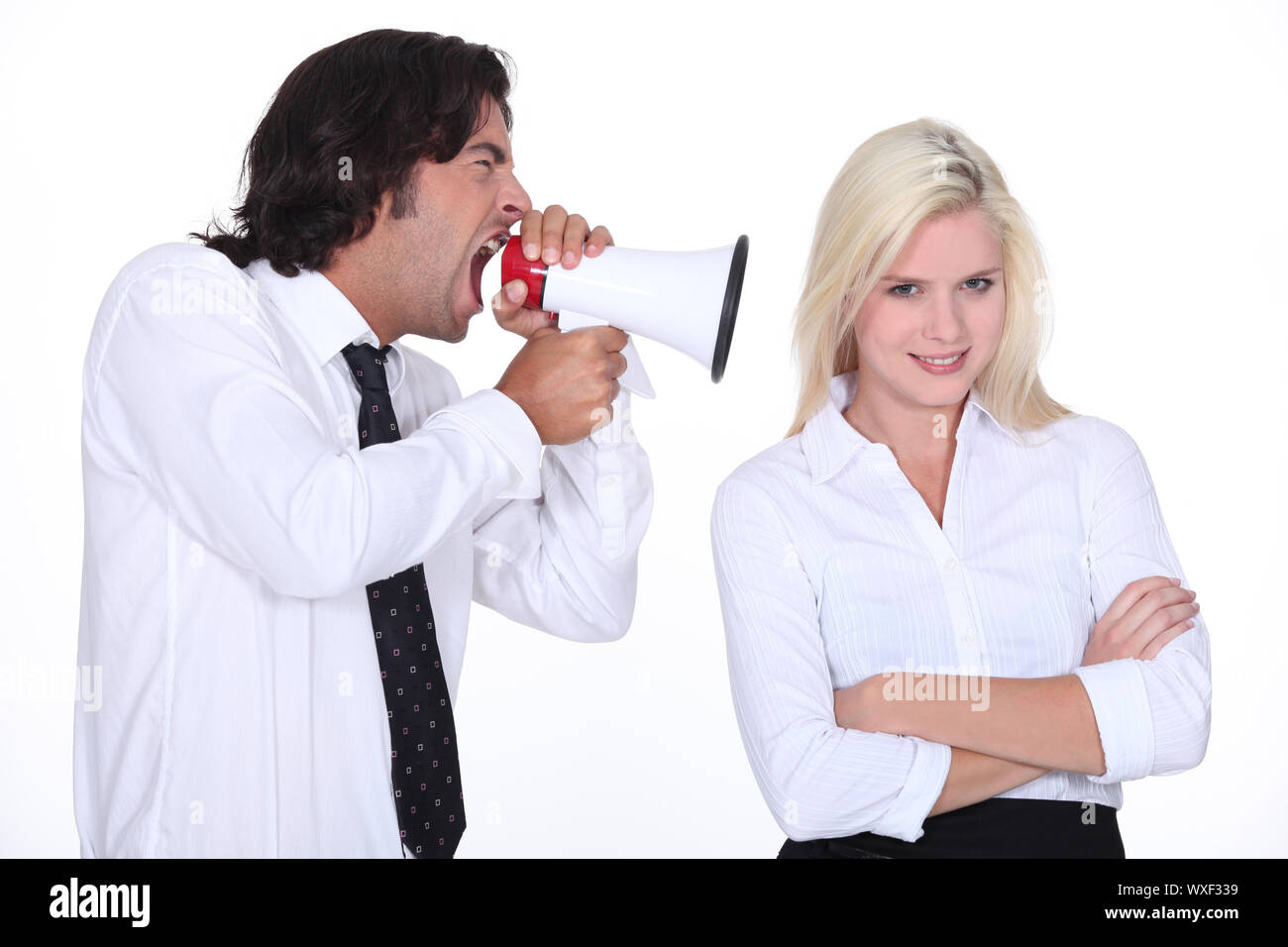 Male shouting in a megaphone Stock Photo - Alamy