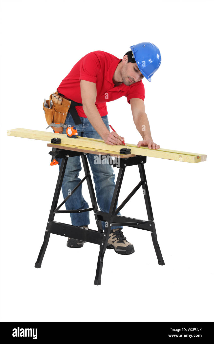 Man marking timber Stock Photo - Alamy