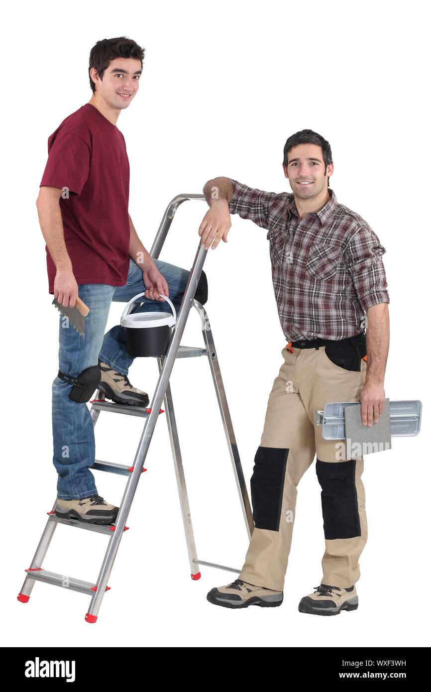 Two male decorators Stock Photo - Alamy