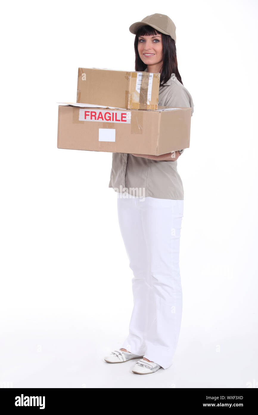 Woman delivering packages Stock Photo - Alamy