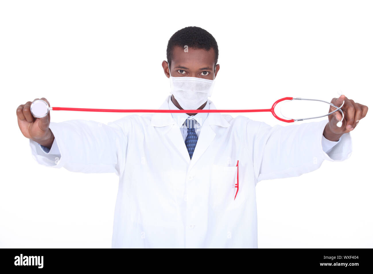 Doctor stretching stethoscope Stock Photo - Alamy