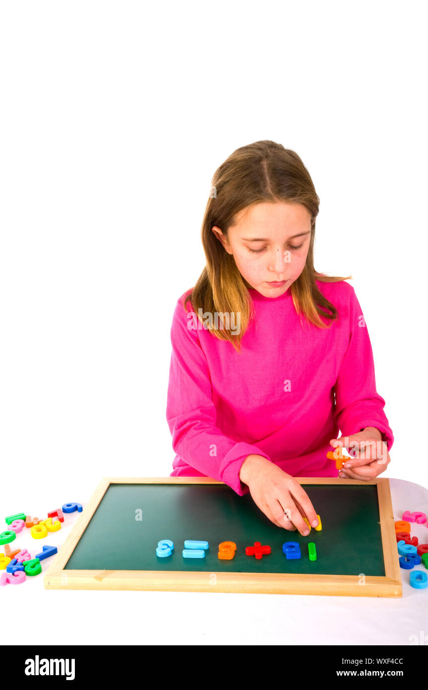 Little girl is working with numbers for educational purpose Stock Photo ...