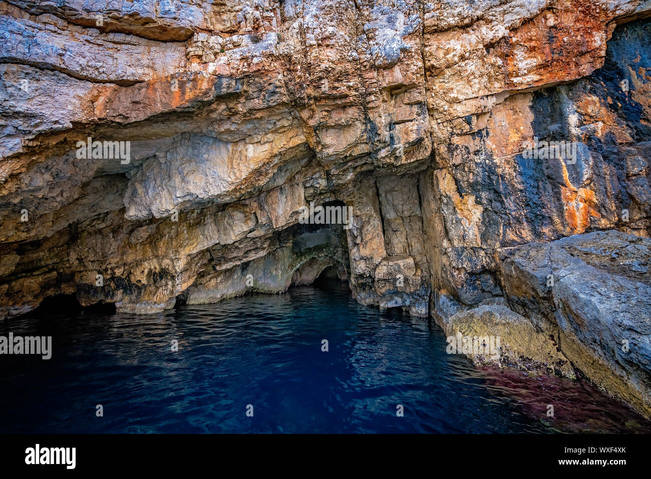 Turquoise water inside Blue Caves Stock Photo - Alamy