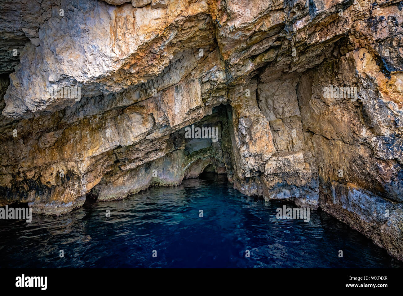 Turquoise water inside Blue Caves Stock Photo - Alamy
