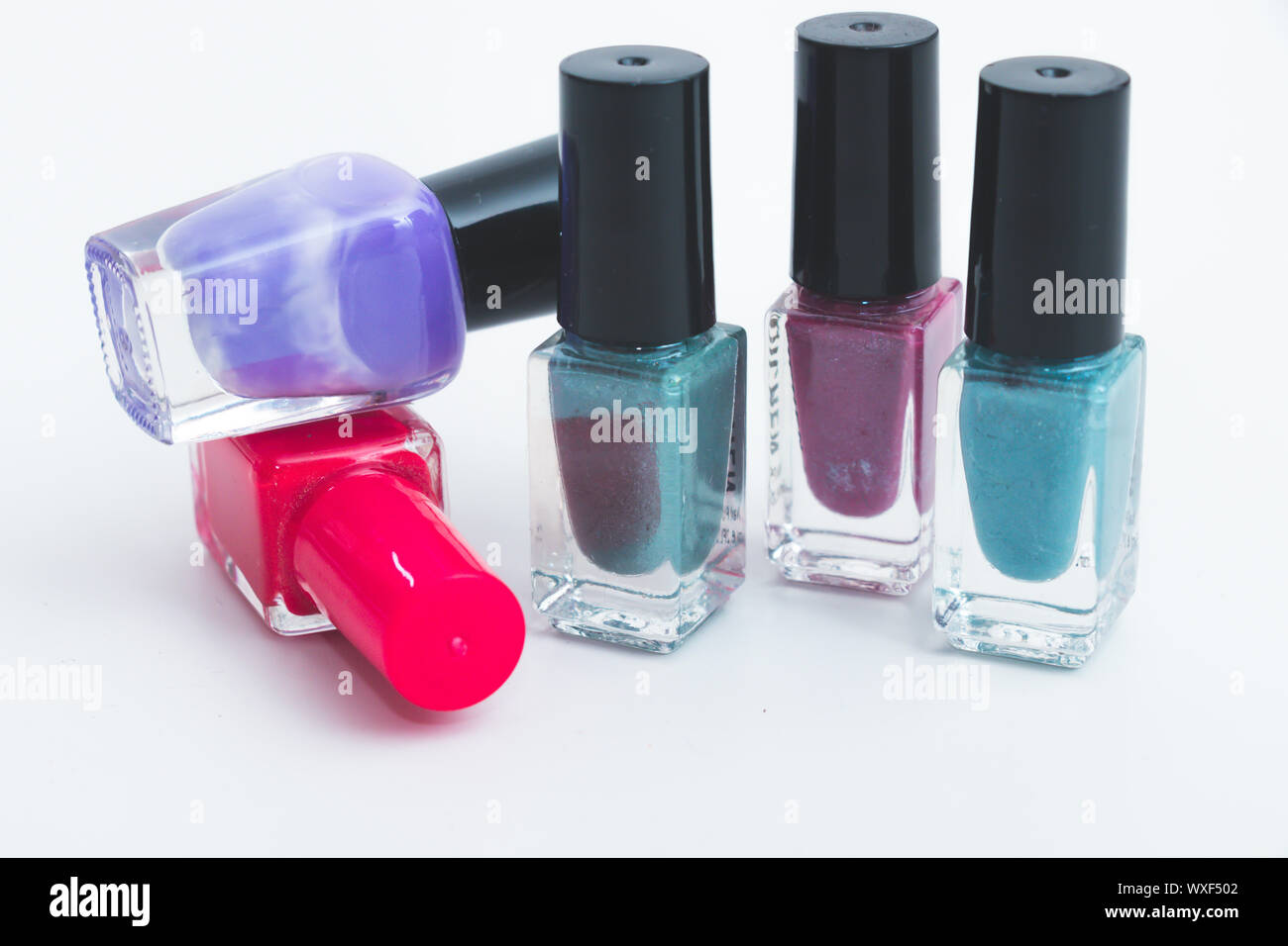 a collage of compositions of nail polish isolated on white Stock Photo ...