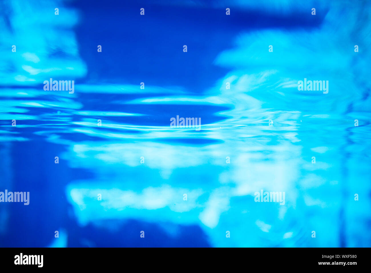 Abstract water surface with blue reflection Stock Photo - Alamy