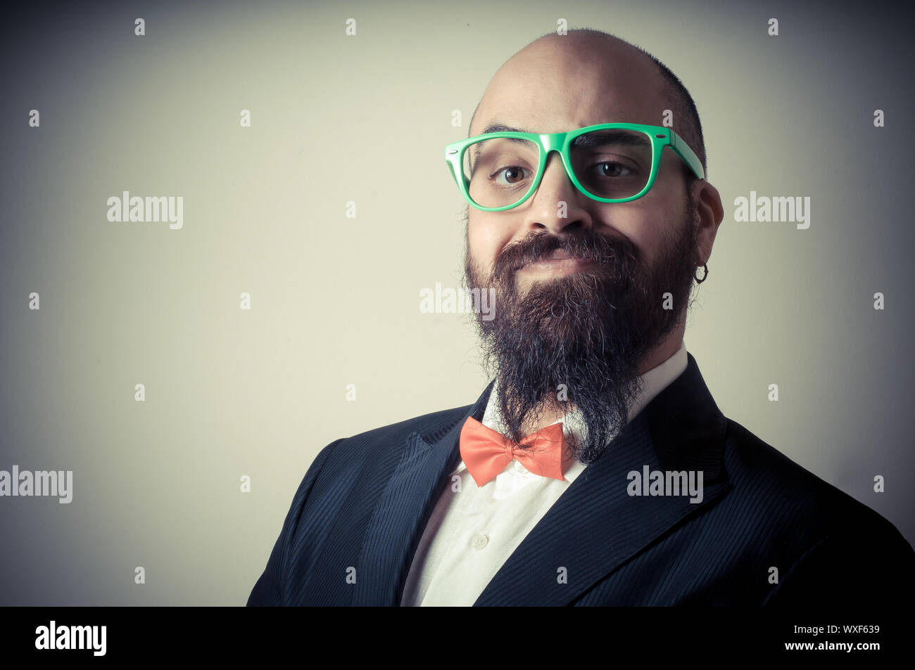 funny elegant bearded man on vignetting background Stock Photo - Alamy