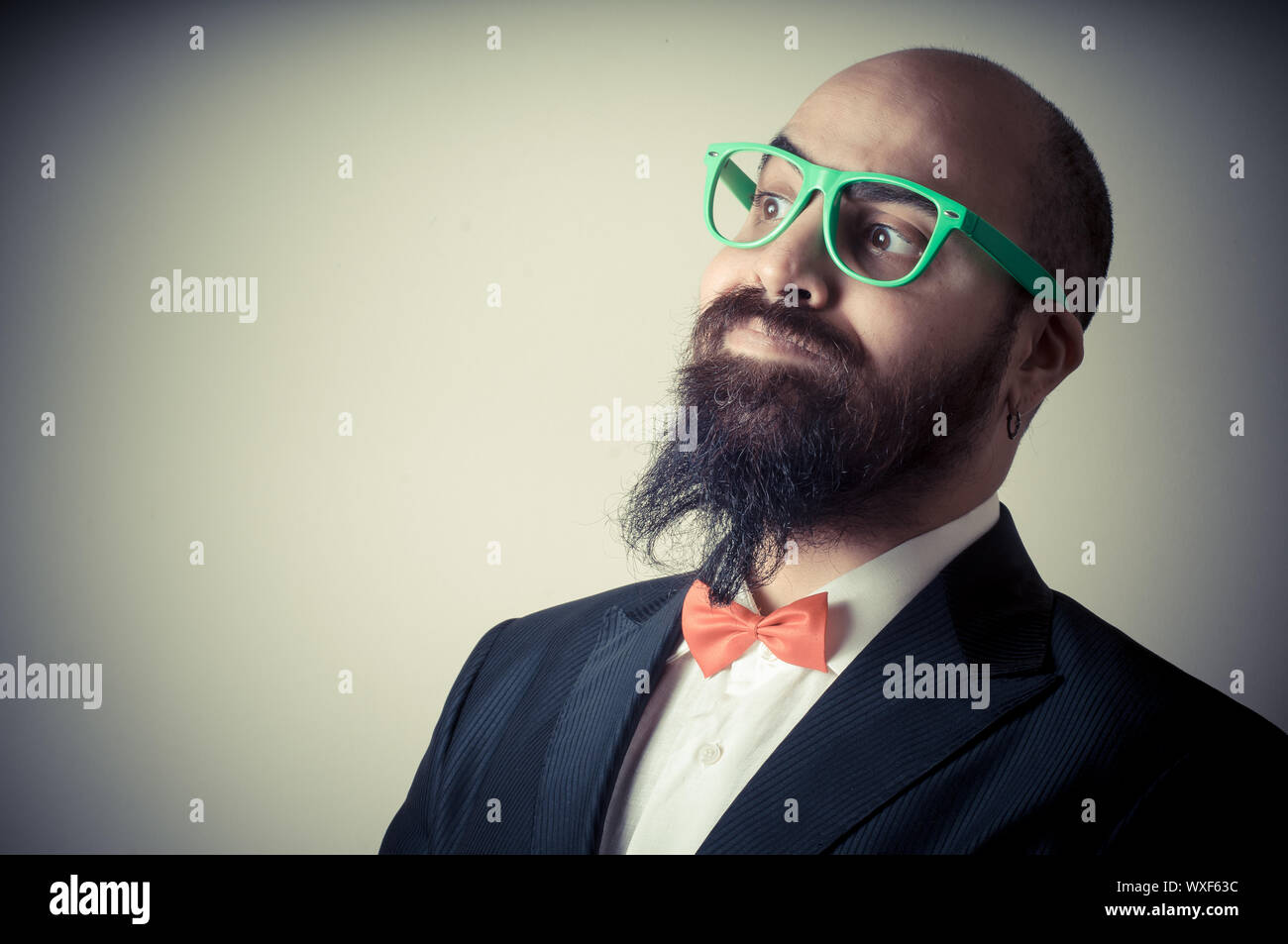 funny elegant bearded man on vignetting background Stock Photo - Alamy