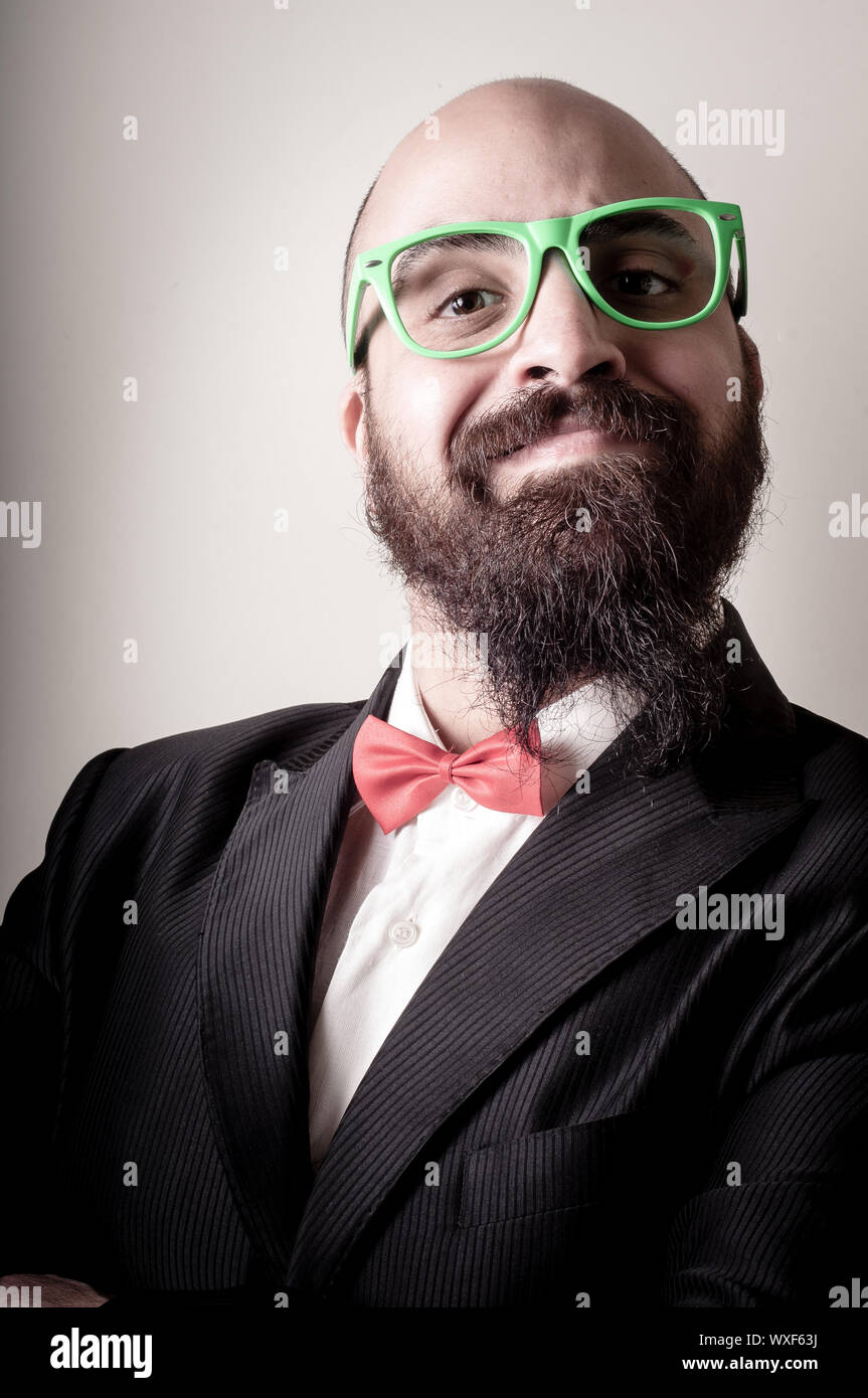 funny elegant bearded man on vignetting background Stock Photo - Alamy