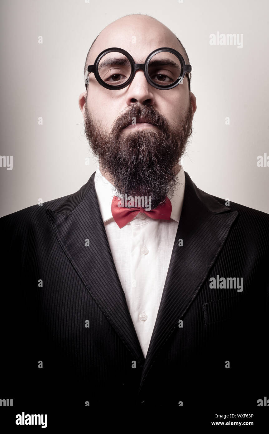 funny elegant bearded man on vignetting background Stock Photo - Alamy