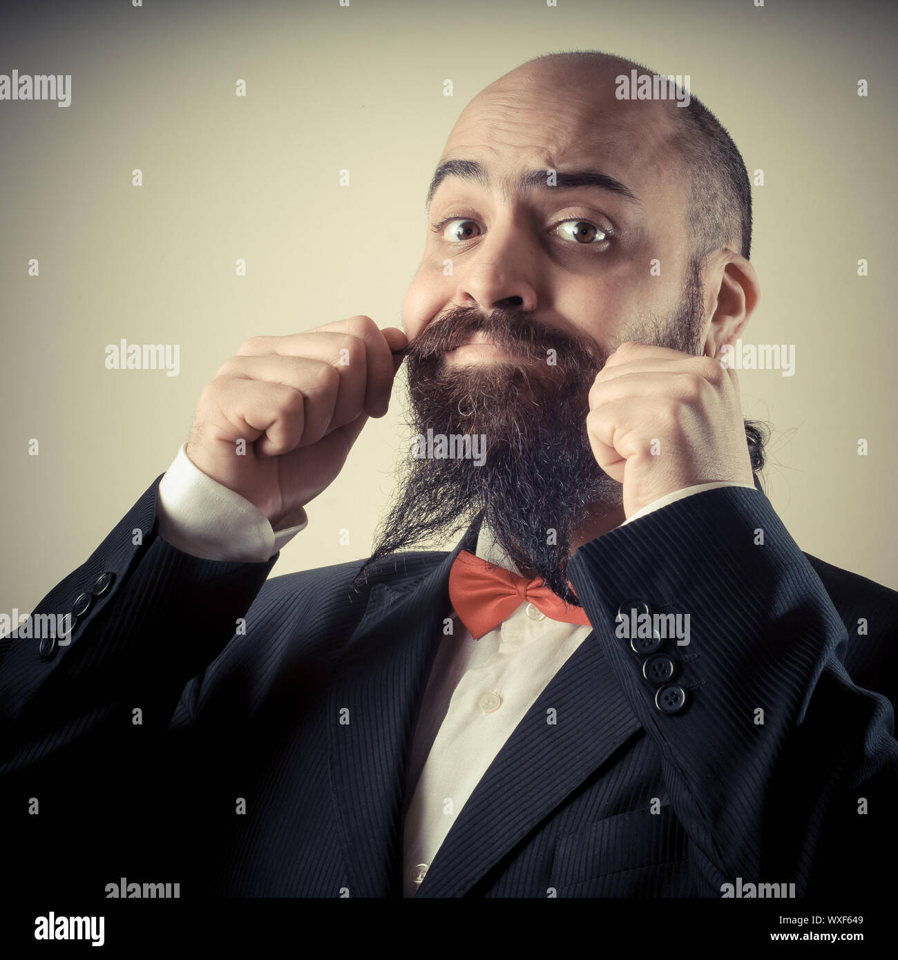 Touching mustache hi-res stock photography and images - Alamy