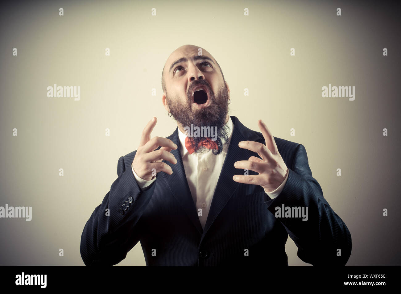 funny afraid elegant bearded man on vignetting background Stock Photo ...