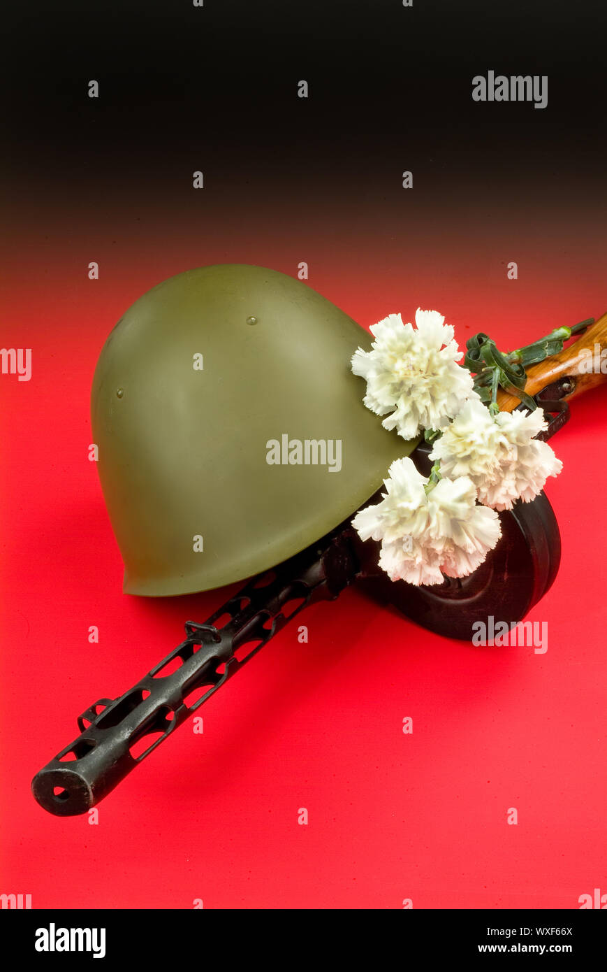 Machine Gun And Flowers Stock Photo - Alamy