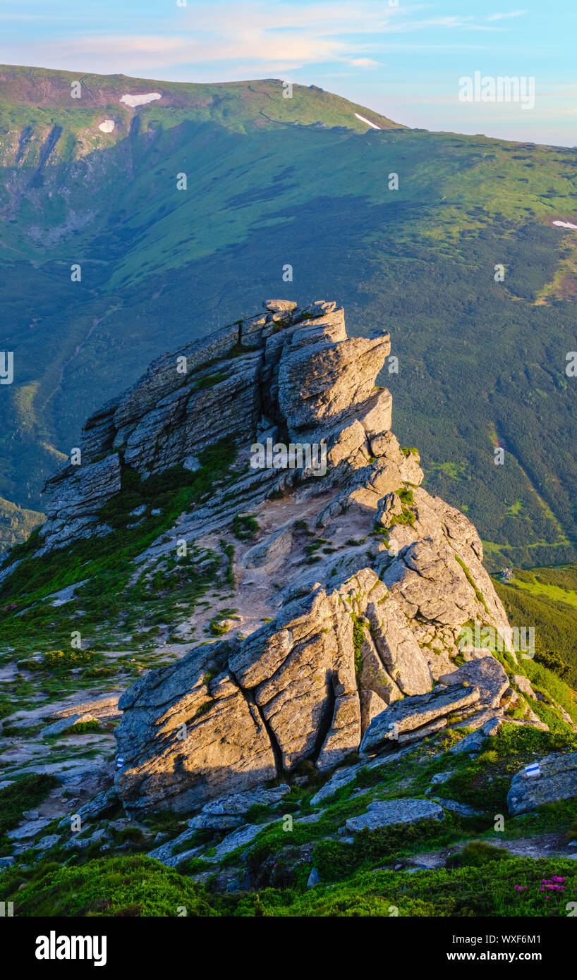 Big boulder on summer mountain slope Stock Photo - Alamy