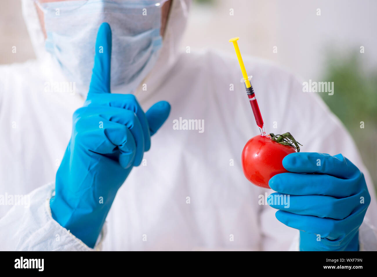 Male nutrition expert testing food products in lab Stock Photo - Alamy