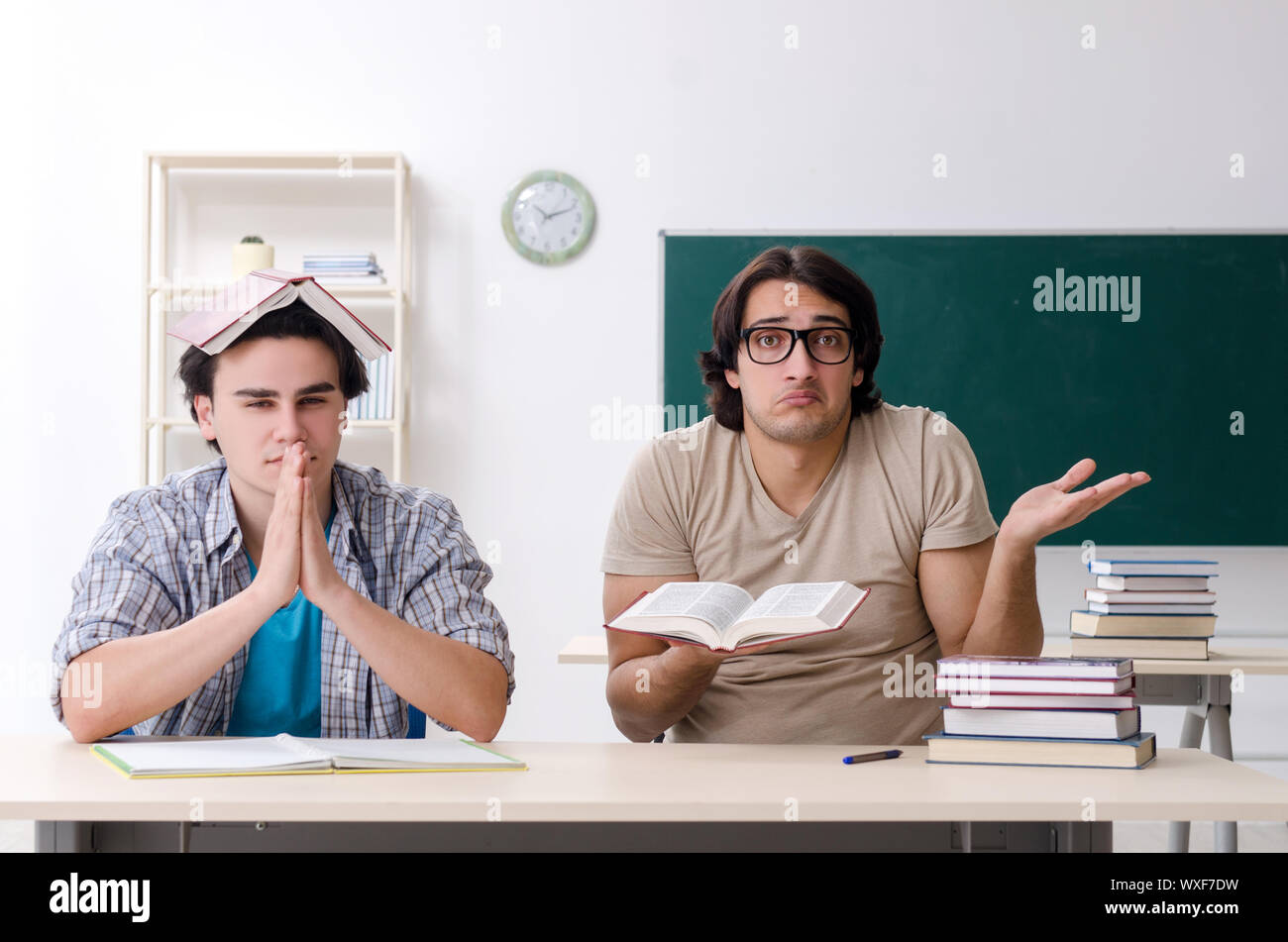 Two male students in the classroom Stock Photo - Alamy
