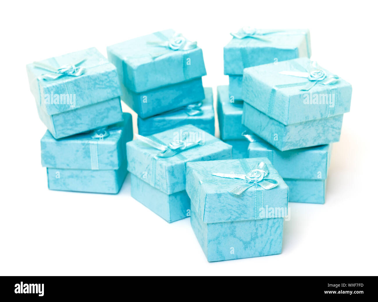 Cyan gift boxes closeup on white background Stock Photo - Alamy