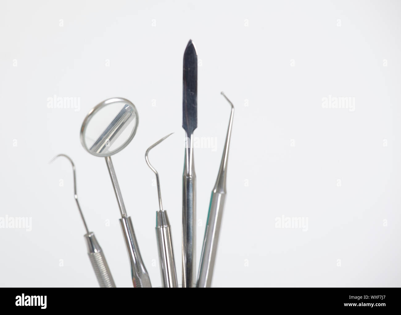 Set of metal medical equipment tools for teeth dental care Stock Photo ...