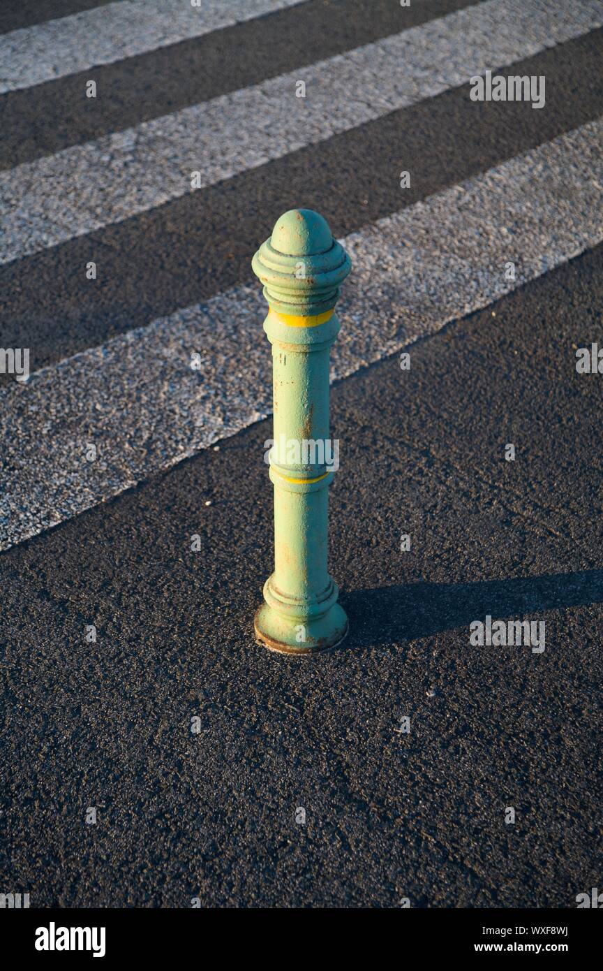 green city bollard on asphalt in a street of vitoria city spain Stock ...