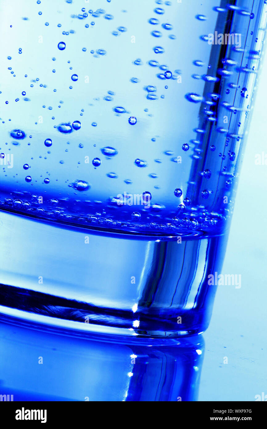 blue bubbled water in glass Stock Photo - Alamy