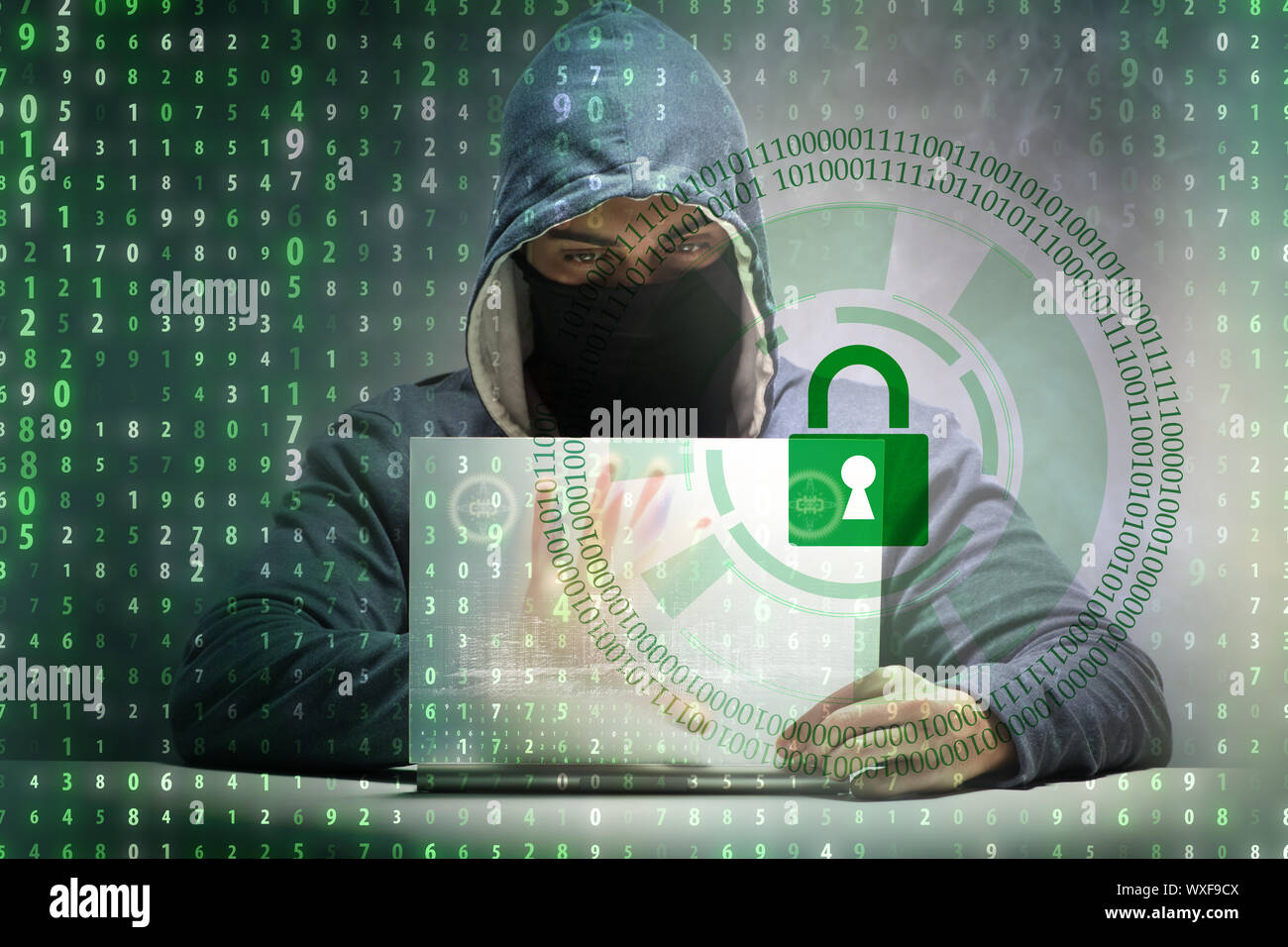 Young hacker in cybersecurty concept Stock Photo - Alamy