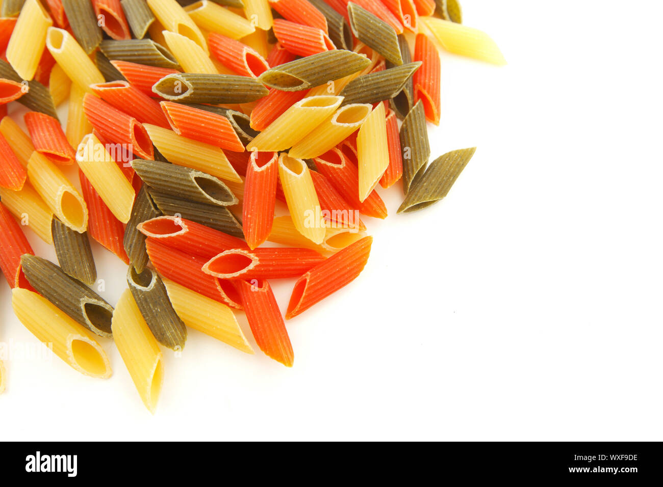 Colored pasta isolated on white background Stock Photo - Alamy