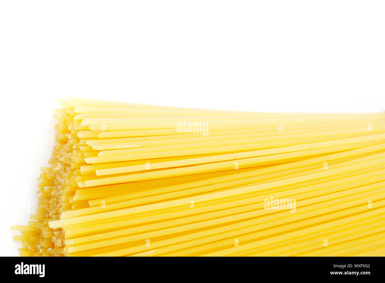 Dry spaghetti isolated on white background Stock Photo - Alamy