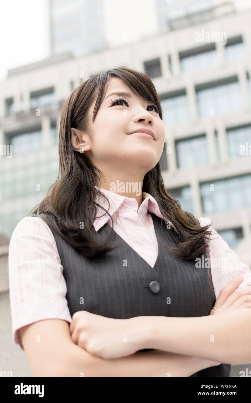 Successful business woman of Asian, closeup portrait in urban Stock ...