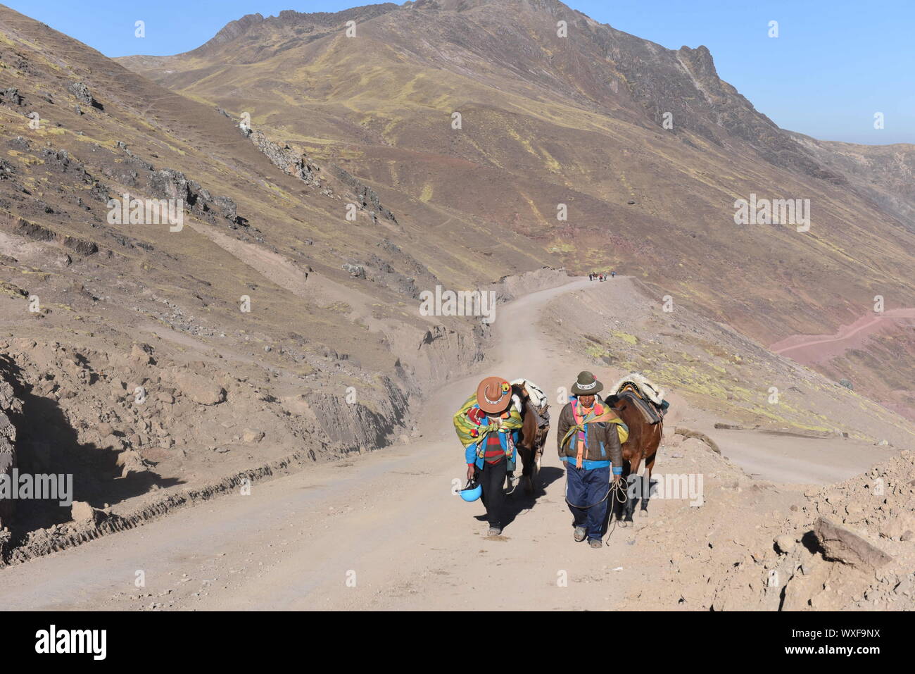 Cusipata, Peru. 16th Sep, 2019. Villagers are seen walking with their ...