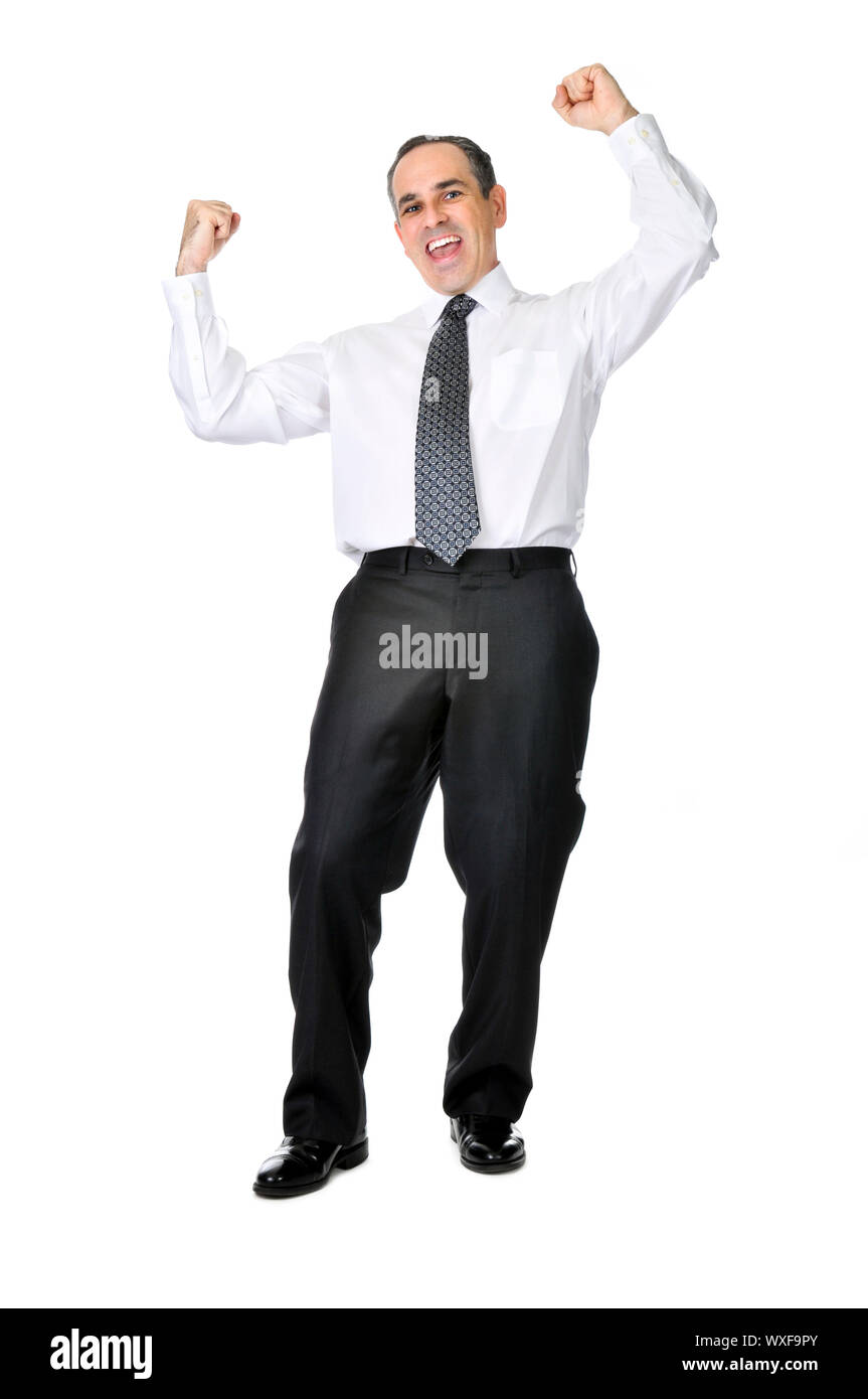 Happy celebrating business man in suit isolated on white background ...