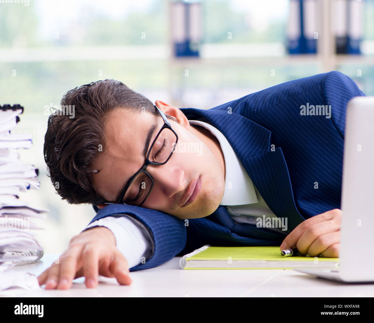 Working hard yawning hi-res stock photography and images - Alamy