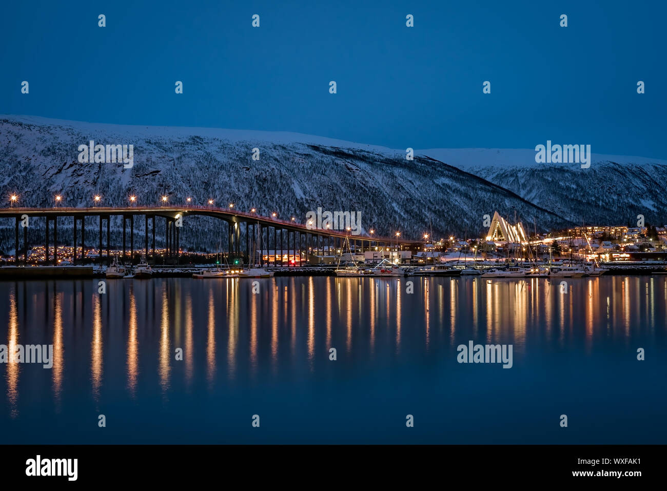 Tromso Bridge across Tromsoysundet strait at night Stock Photo - Alamy