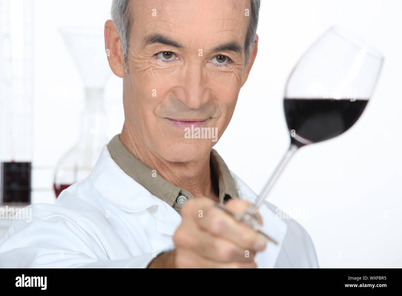 Man tasting red wine Stock Photo - Alamy