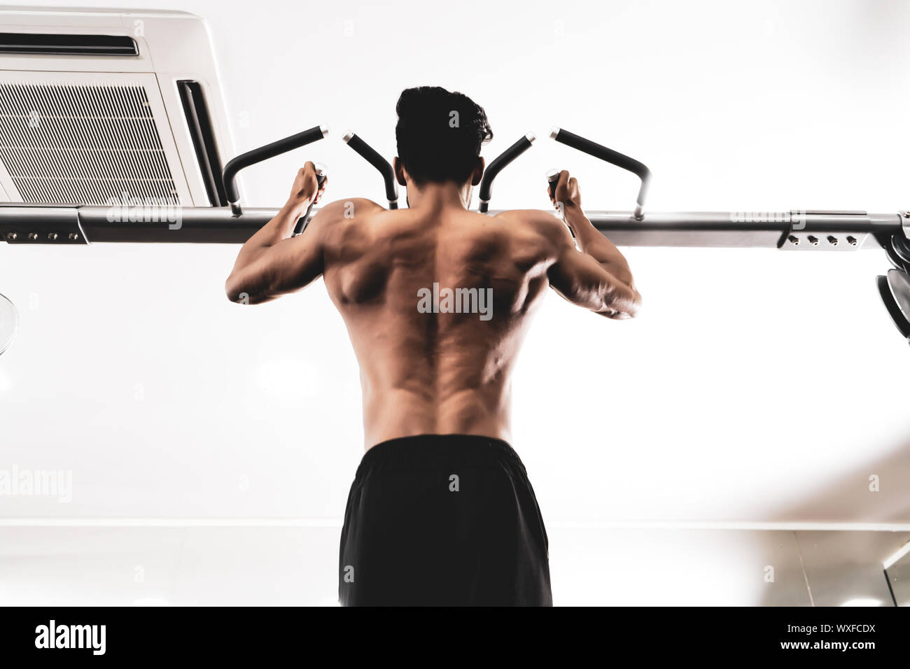 Male bodybuilder flexing his biceps hi-res stock photography and images ...