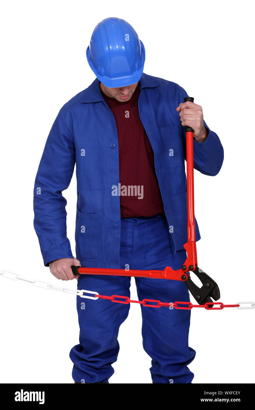 Concentrated construction worker cutting hi-res stock photography and ...