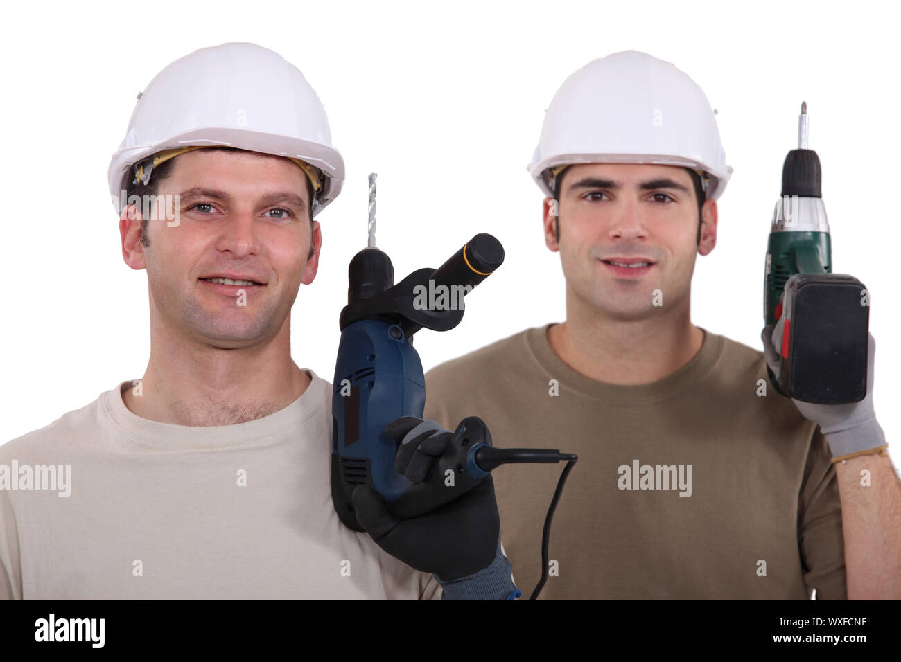 Man with drill in hand Stock Photo - Alamy