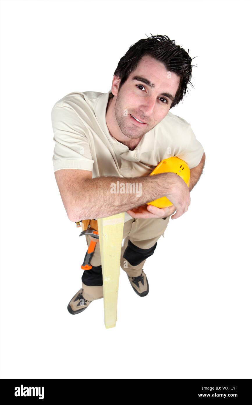Carpenter staring up Stock Photo - Alamy