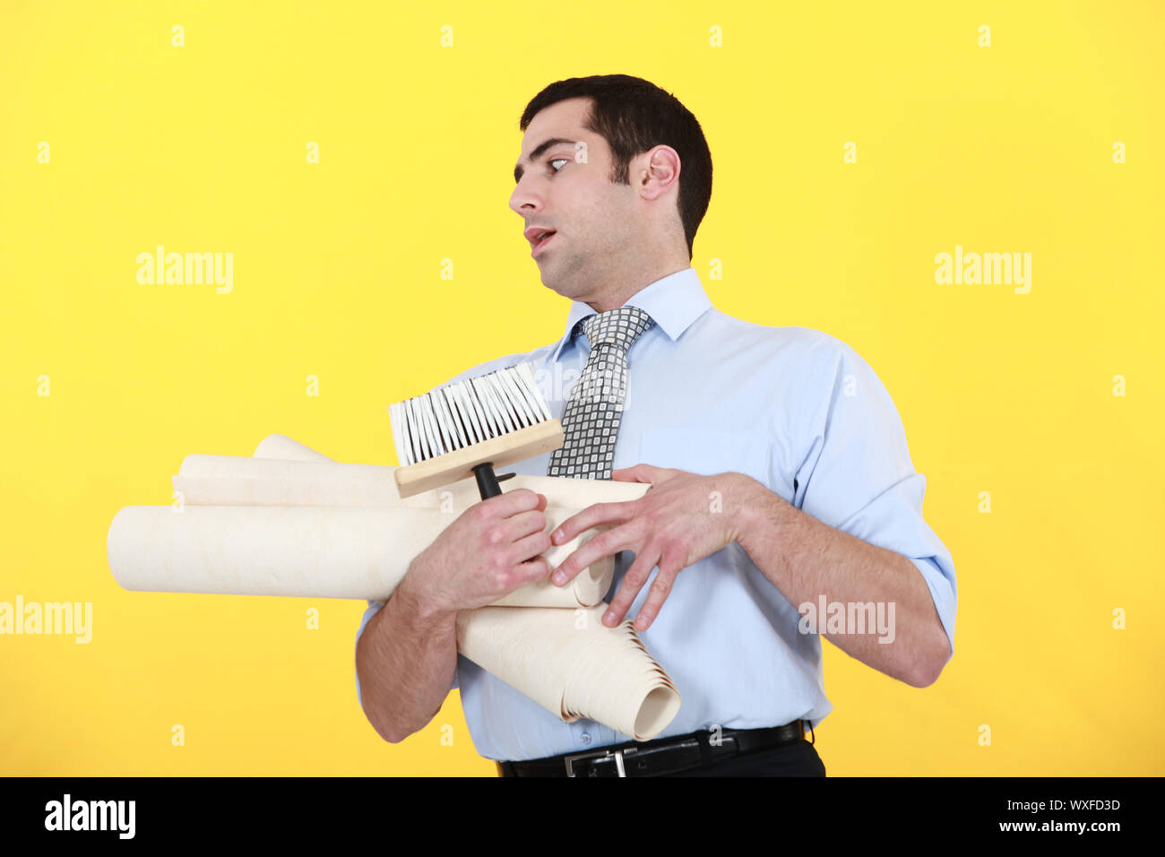 Concerned man with wallpaper Stock Photo - Alamy