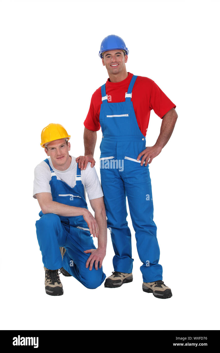 Construction workers pose for camera hi-res stock photography and ...
