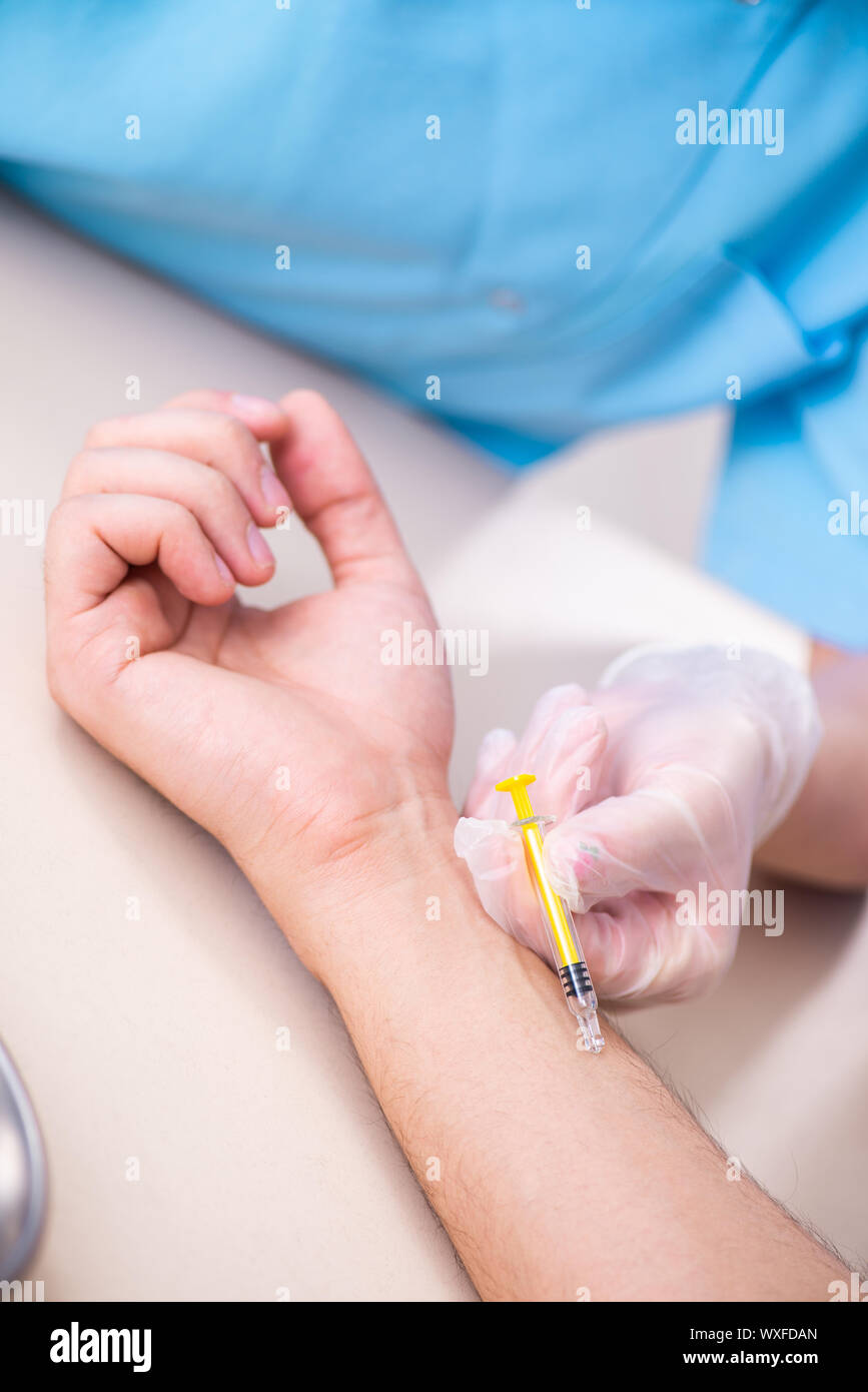 Blood transfusion in hospital clinic Stock Photo - Alamy