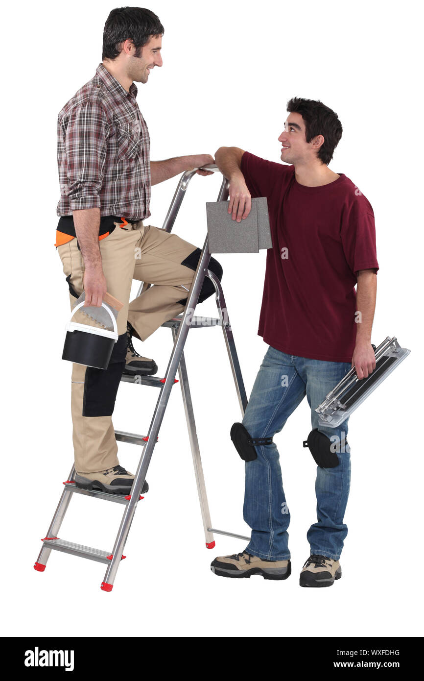Two male decorators Stock Photo - Alamy