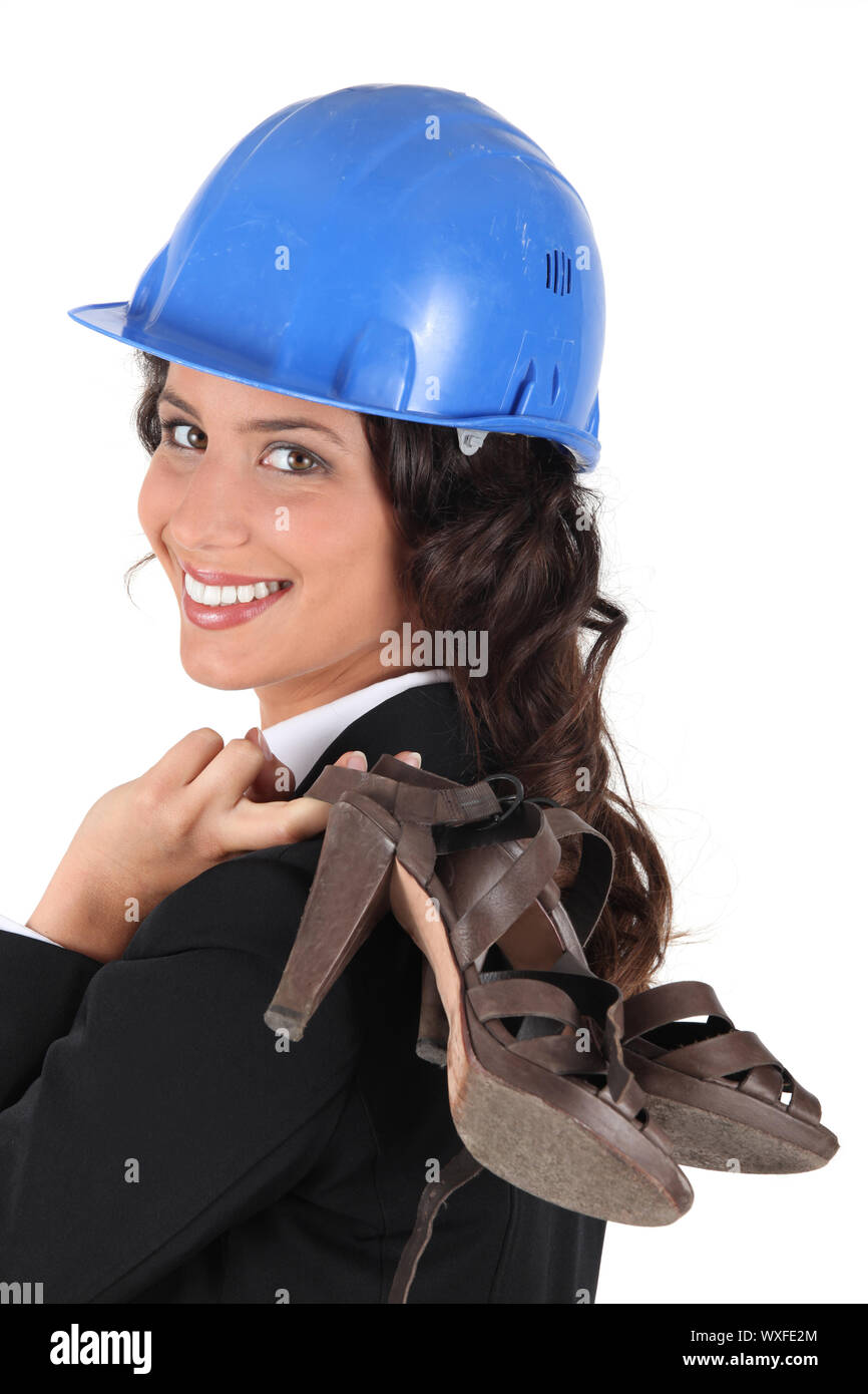 Woman carrying her shoes Stock Photo - Alamy