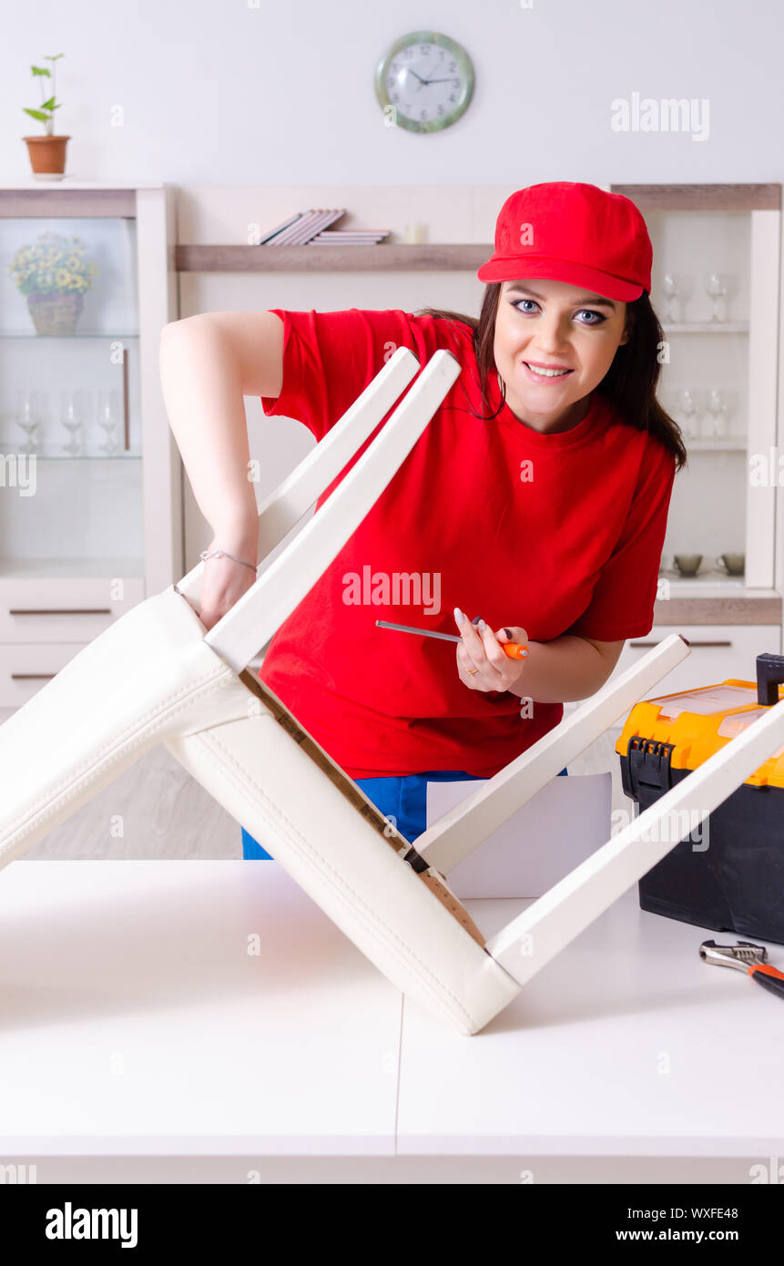 Worker screwdriver assembling chair hi-res stock photography and images ...