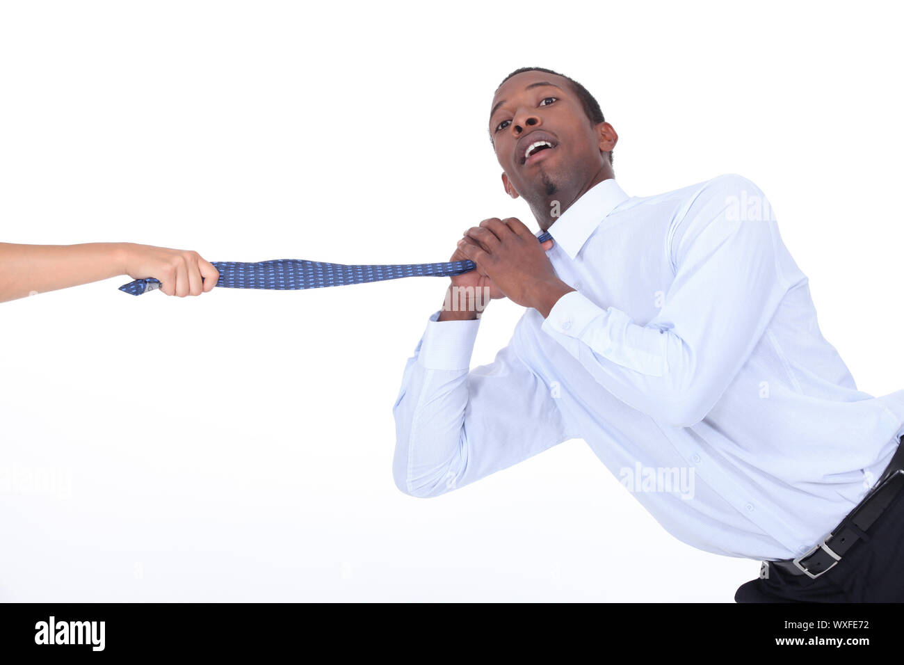 Female hand pulling man's tie Stock Photo - Alamy